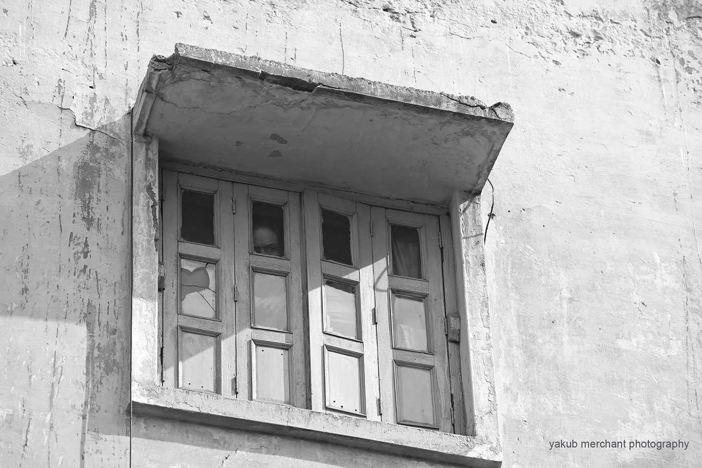 Yakub Merchant's Street Photography Frames People in Windows